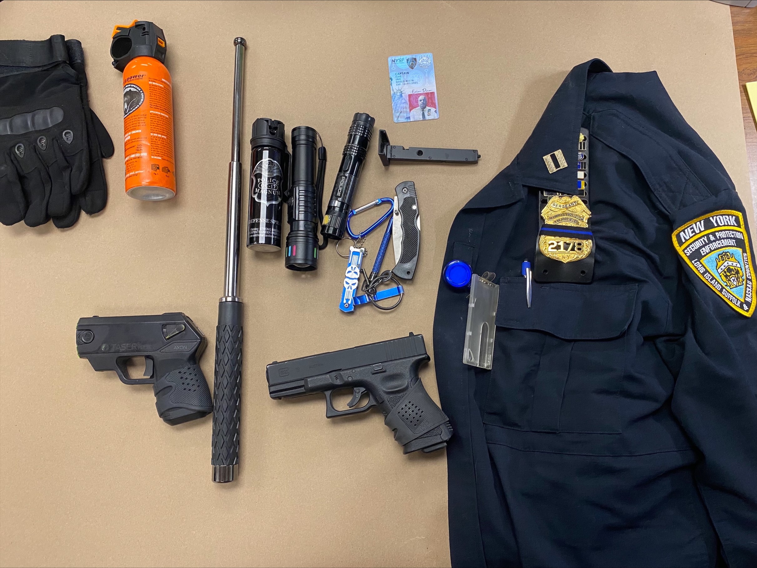 Man Posing As Security Guard Arrested for Weapons Possession - Long ...